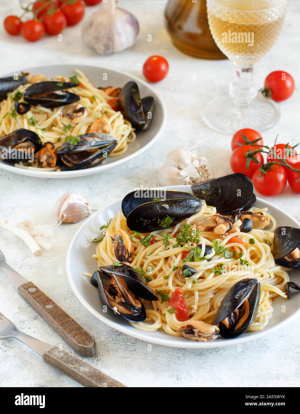 Spaghetti with mussels and tomatoes italian seafood pasta close up ...