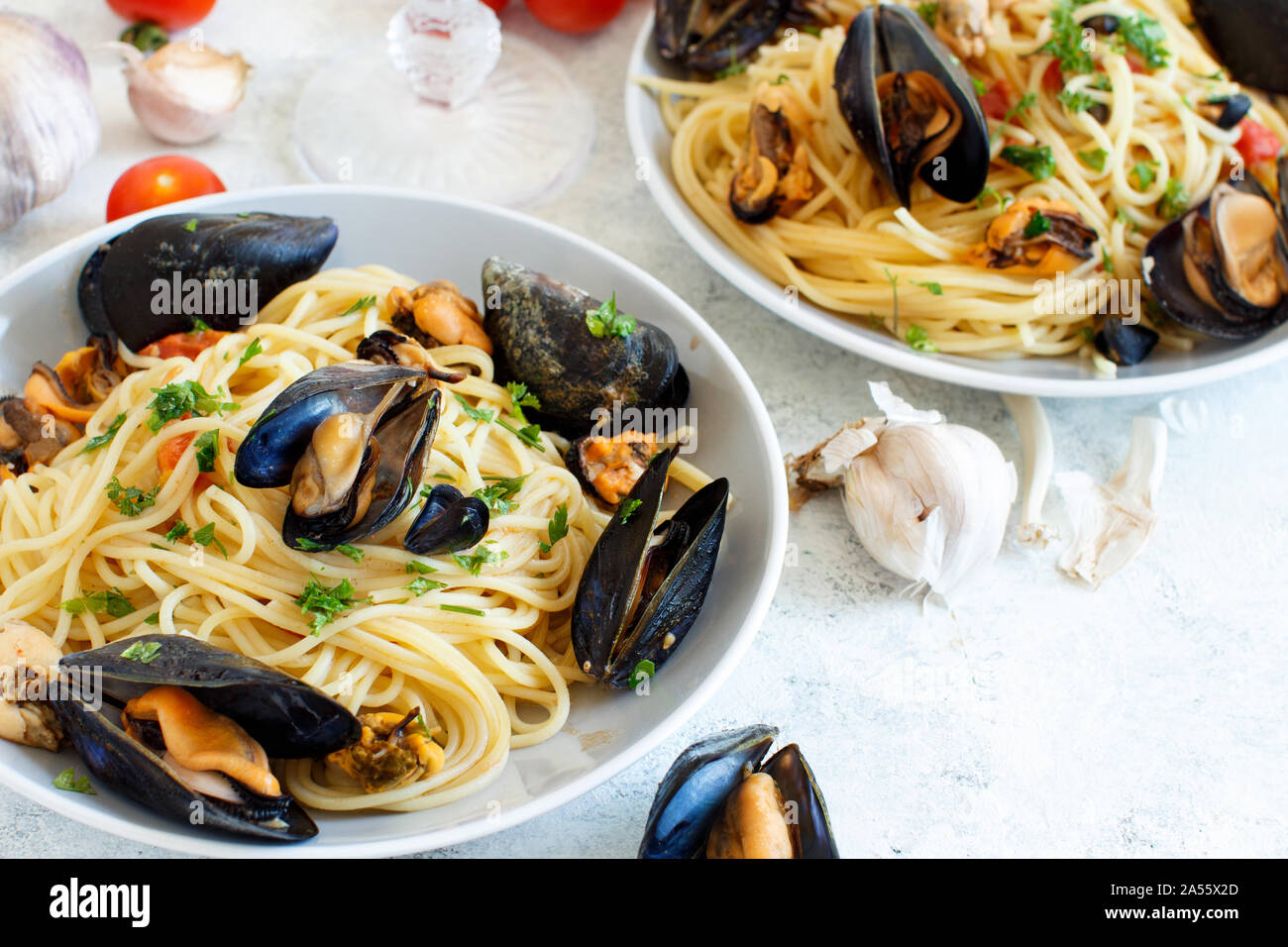 Spaghetti with mussels and tomatoes italian seafood pasta close up ...