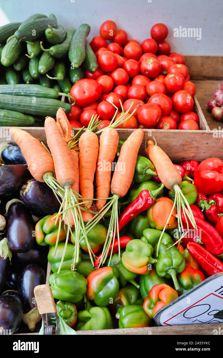 Fresh vegetables at a market stall Stock Photo - Alamy
