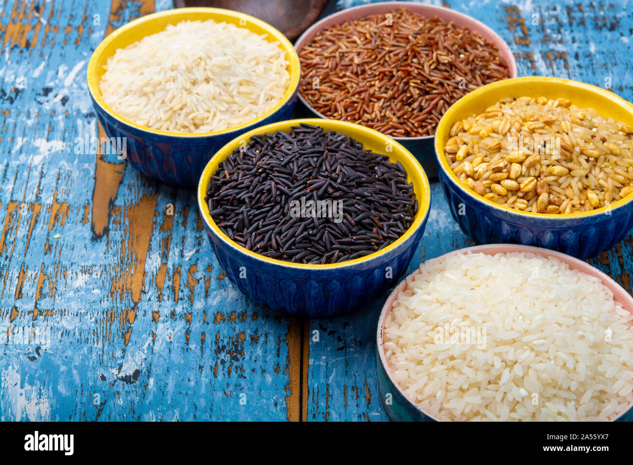 Different types of rice, white basmati, jasmine, arborio, brown and ...