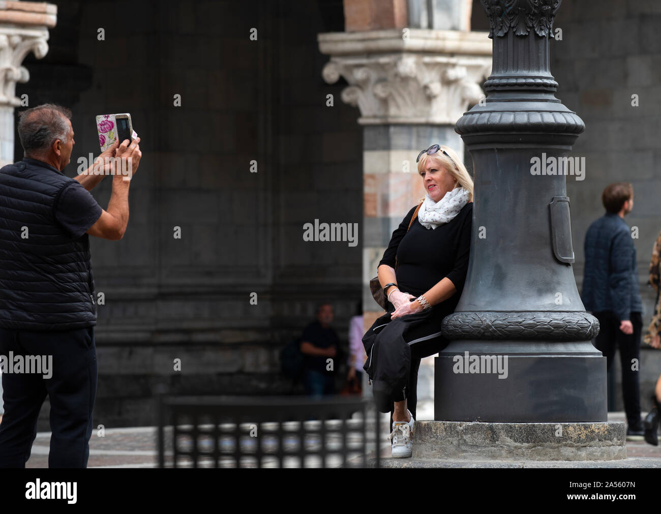 Como, Lombardy Italy Sept 2019 Well dressed young people enjoing ...