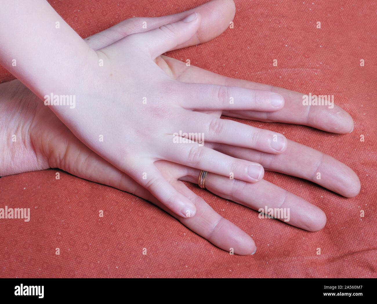 Hand together love family sign Stock Photo - Alamy