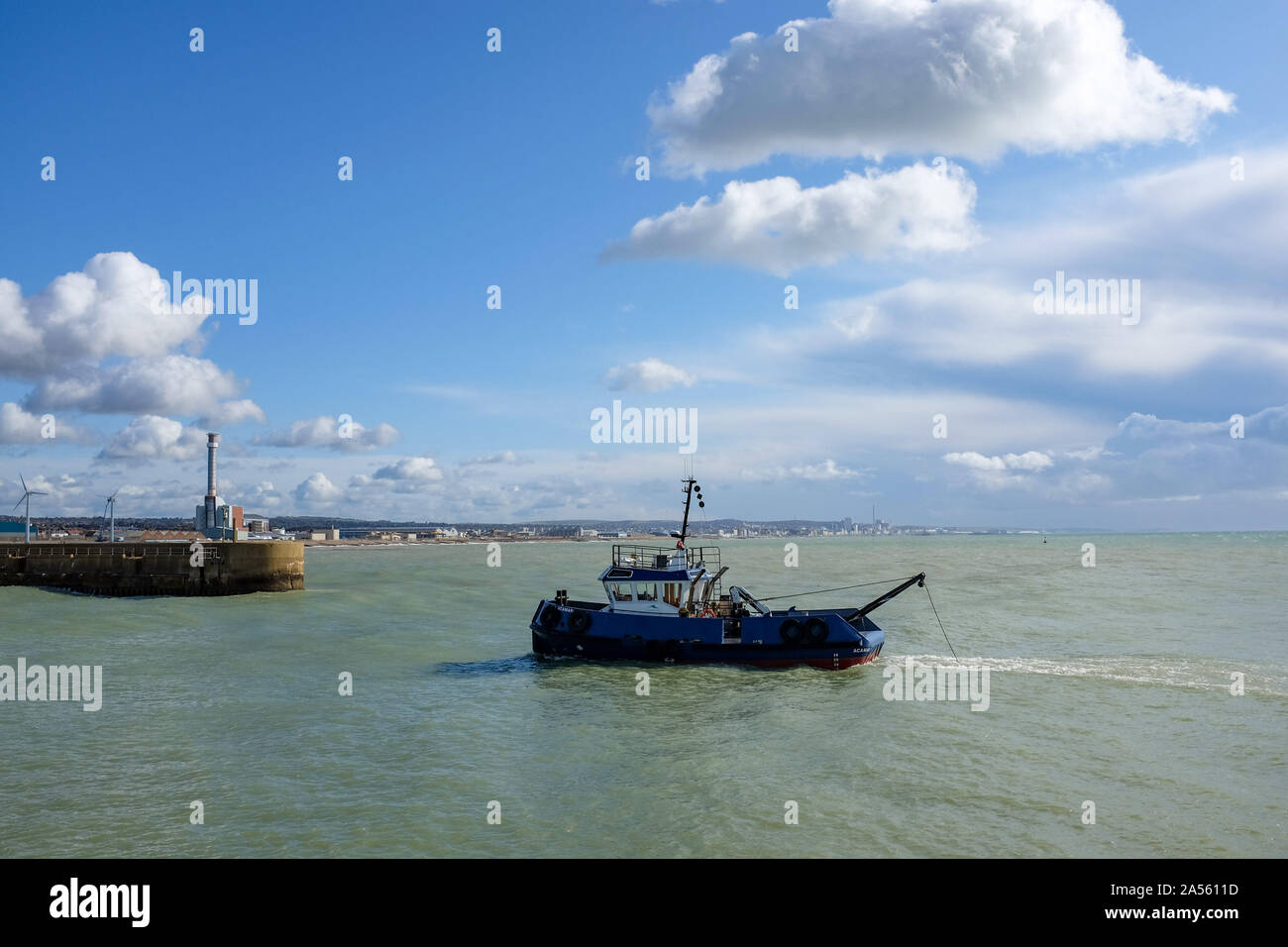 The small boat the fishing boat into the sea entrance hi-res stock ...