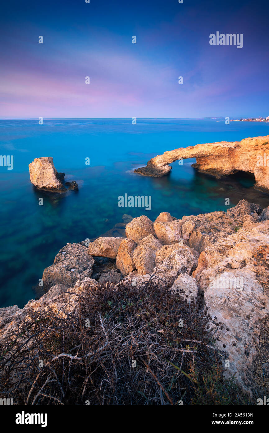 Natural rocky "bridge", known as the "Bridge of Love" at Cape Greco ...