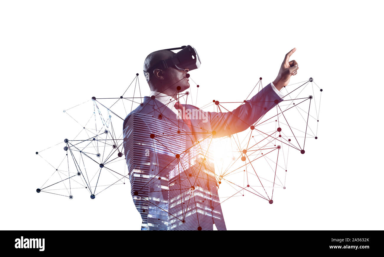 Black man standing with VR headset. African businessman wearing VR ...