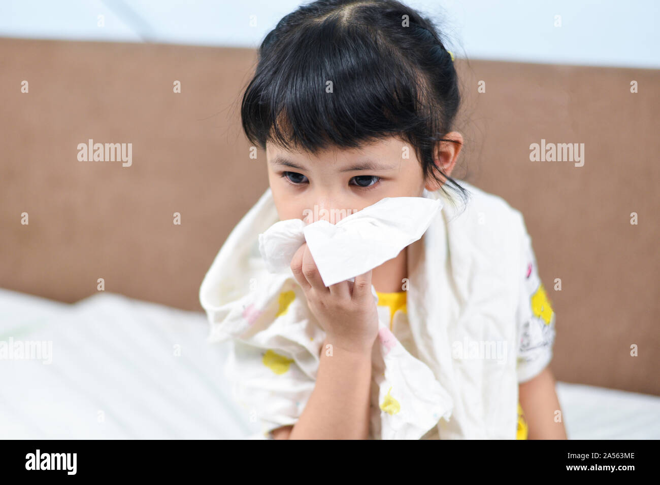 Asian Girl Blowing Nose High Resolution Stock Photography and Images ...