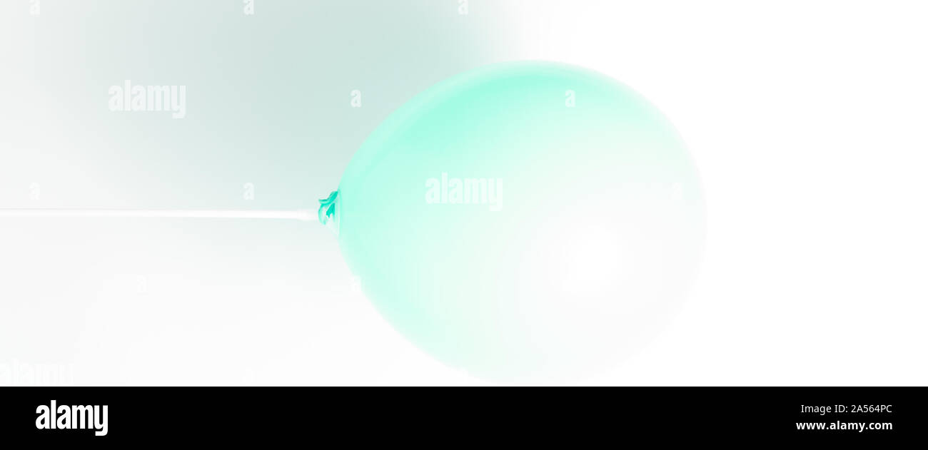 Green balloon on white background with shadow. Strong light Stock Photo ...