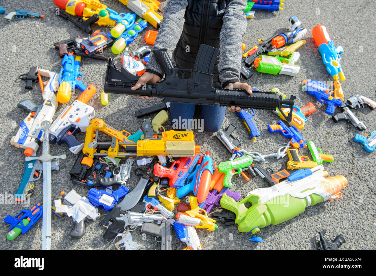 Children holding toys school hi-res stock photography and images - Alamy