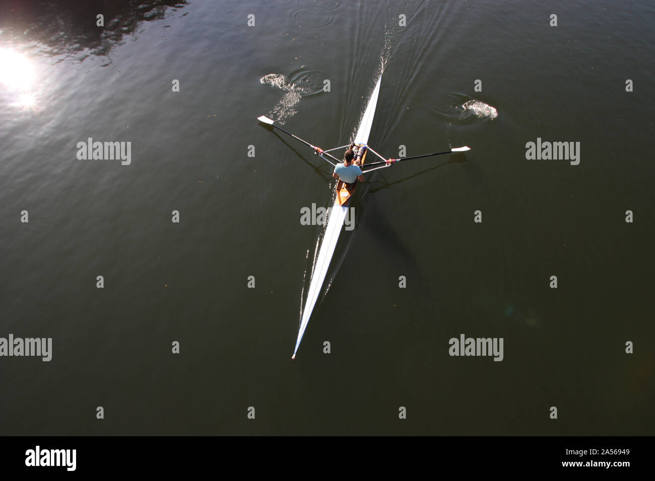 Aerial view of a rower rowing a single skull in Oxford on the Thames ...
