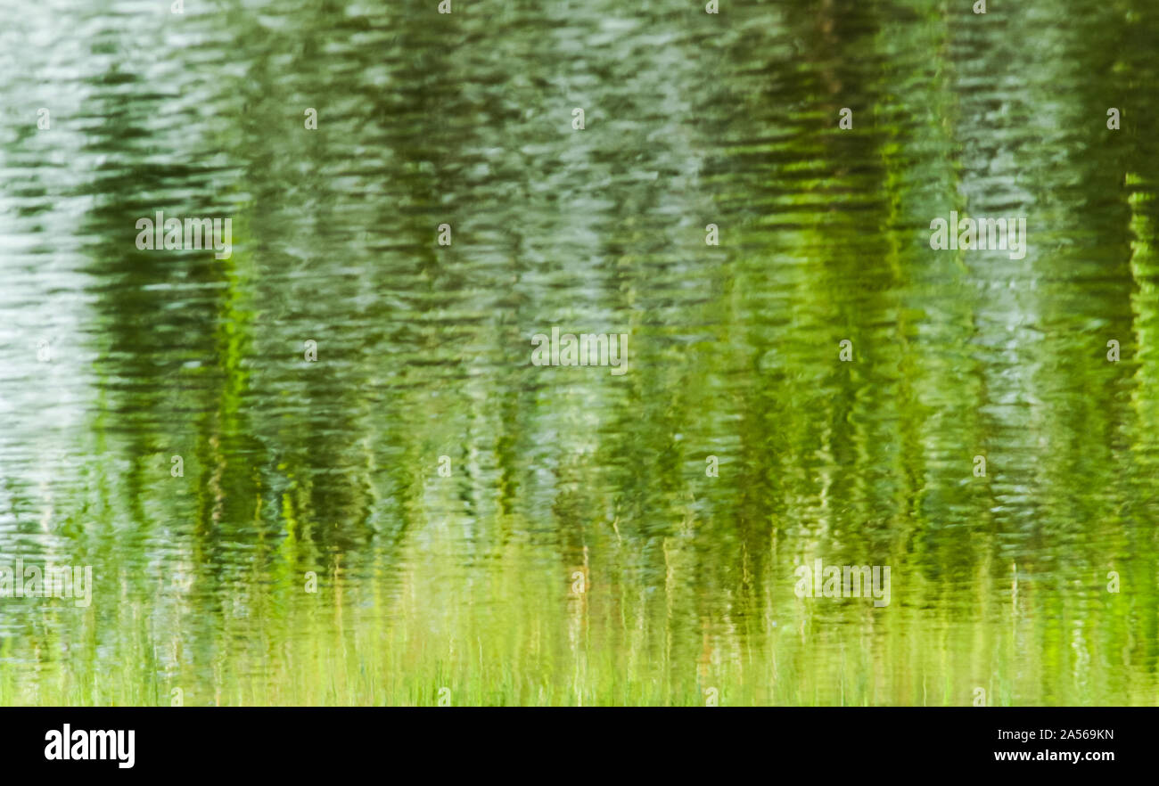 water surface reflection abstract art for background and wallpaper ...