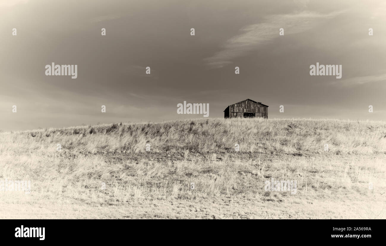 Barn on a hill Stock Photo - Alamy