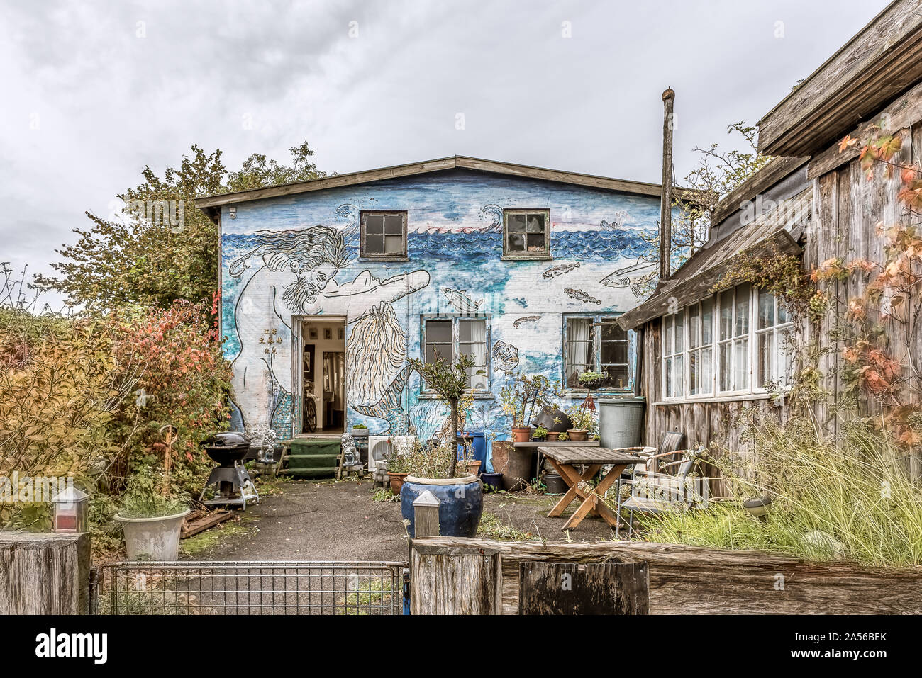 Colourful artistic house in hippie style in the old fishing port of ...