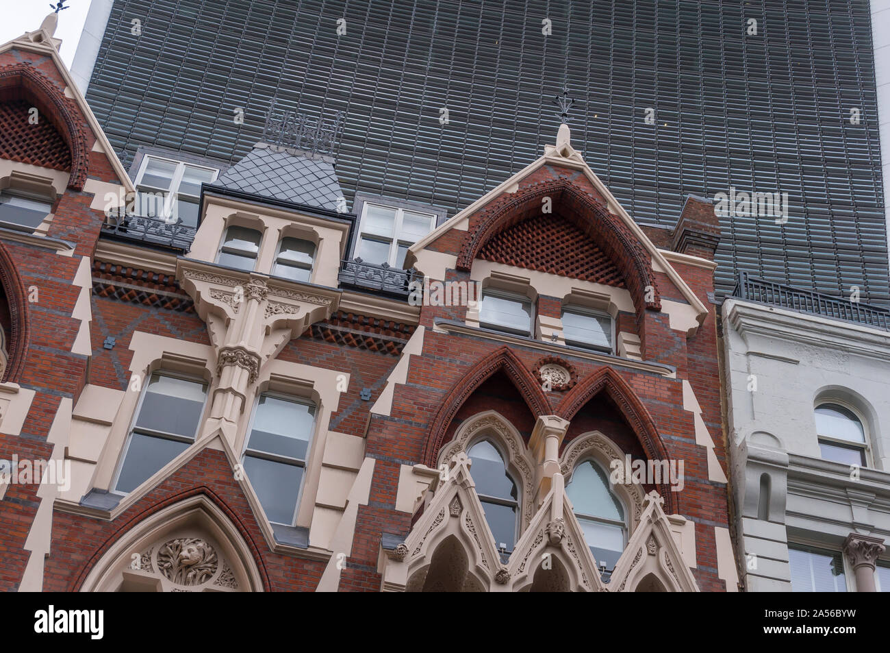 Fantastic classic architecture in City of London with skyscrapers in ...