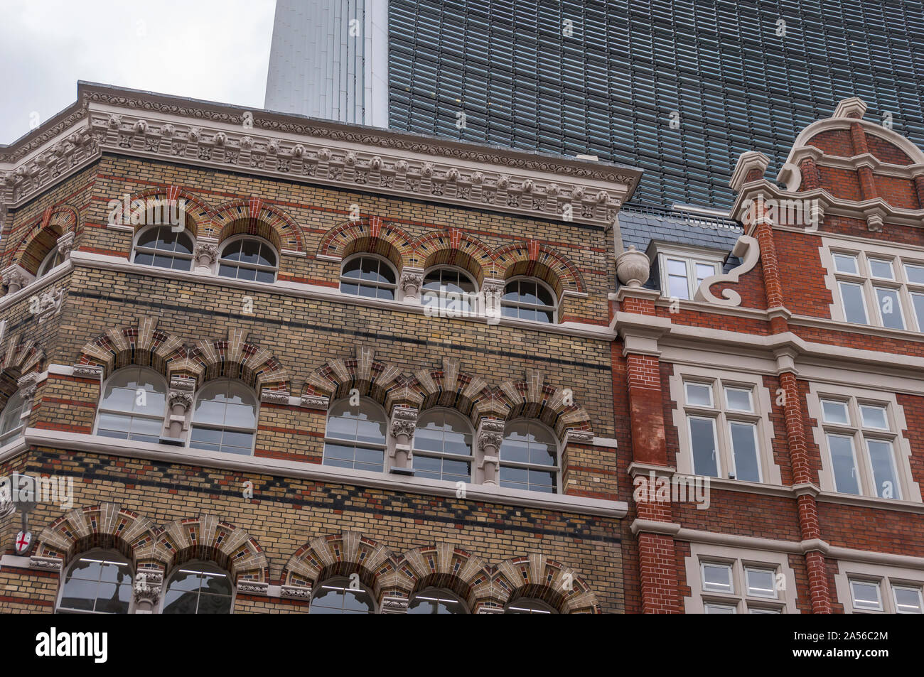 Fantastic classic architecture in City of London with skyscrapers in ...