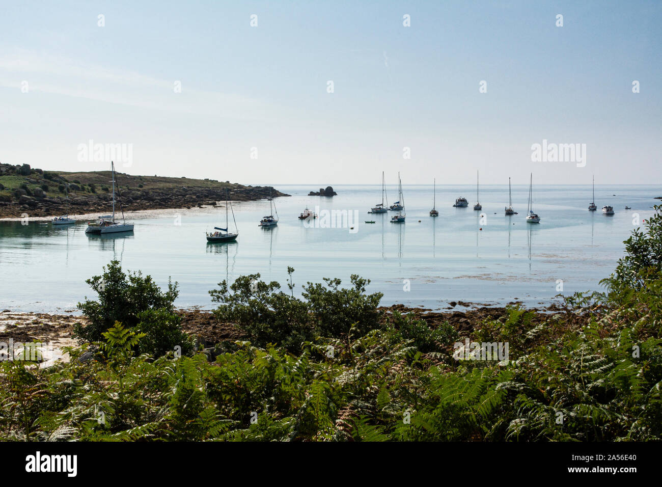 Boats at anchor in The Cove between St Agnes and Gugh, Isles of Scilly ...