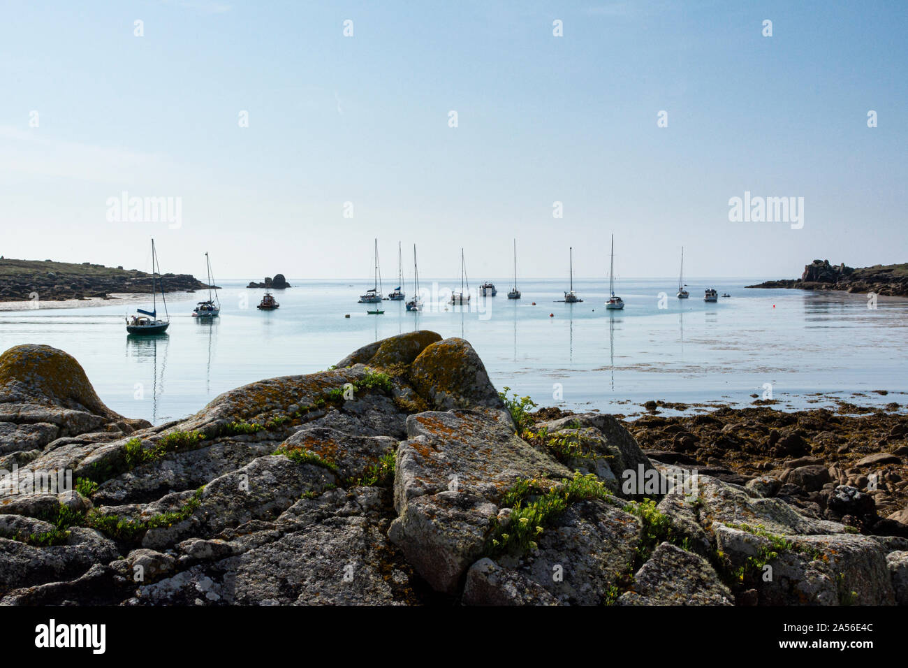 Boats at anchor in The Cove between St Agnes and Gugh, Isles of Scilly ...