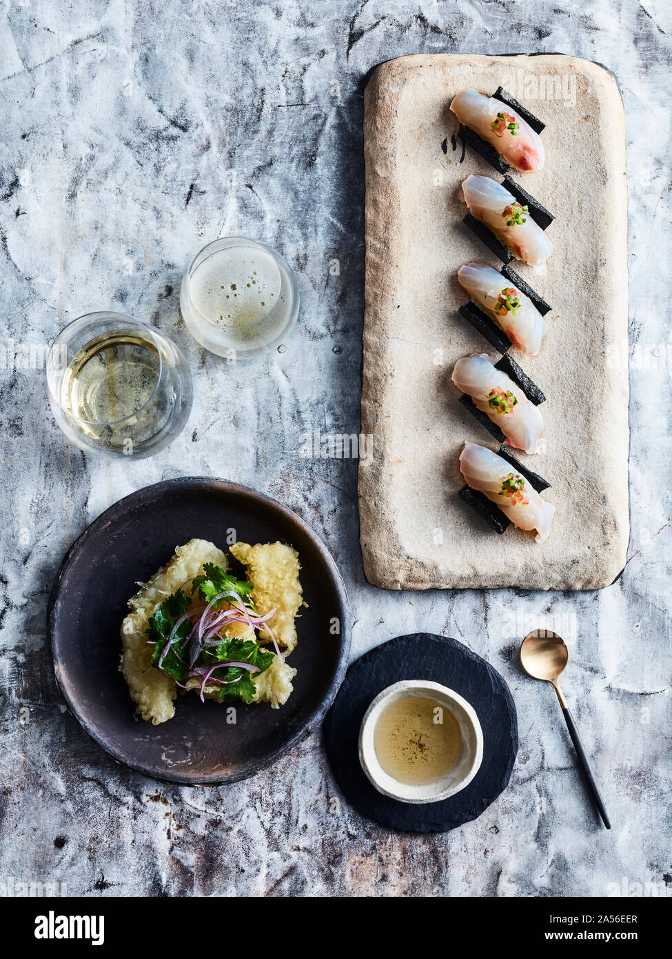 Ceviche sushi and flounder tempura with amazu salad Stock Photo - Alamy