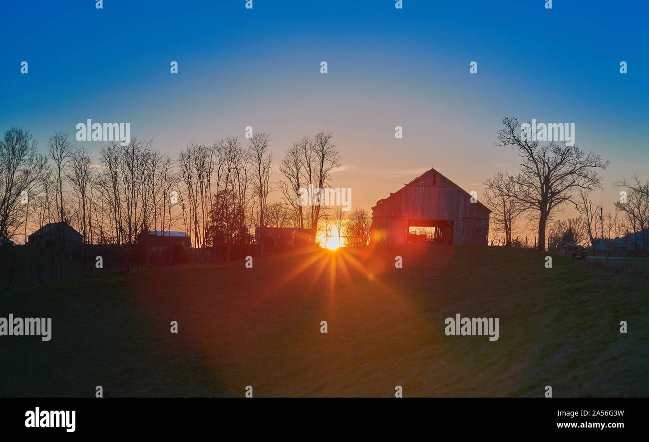 Rustic barn dark clouds hi-res stock photography and images - Alamy