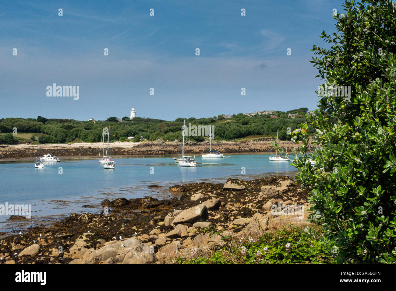 Boats at anchor in The Cove between St Agnes and Gugh, Isles of Scilly ...