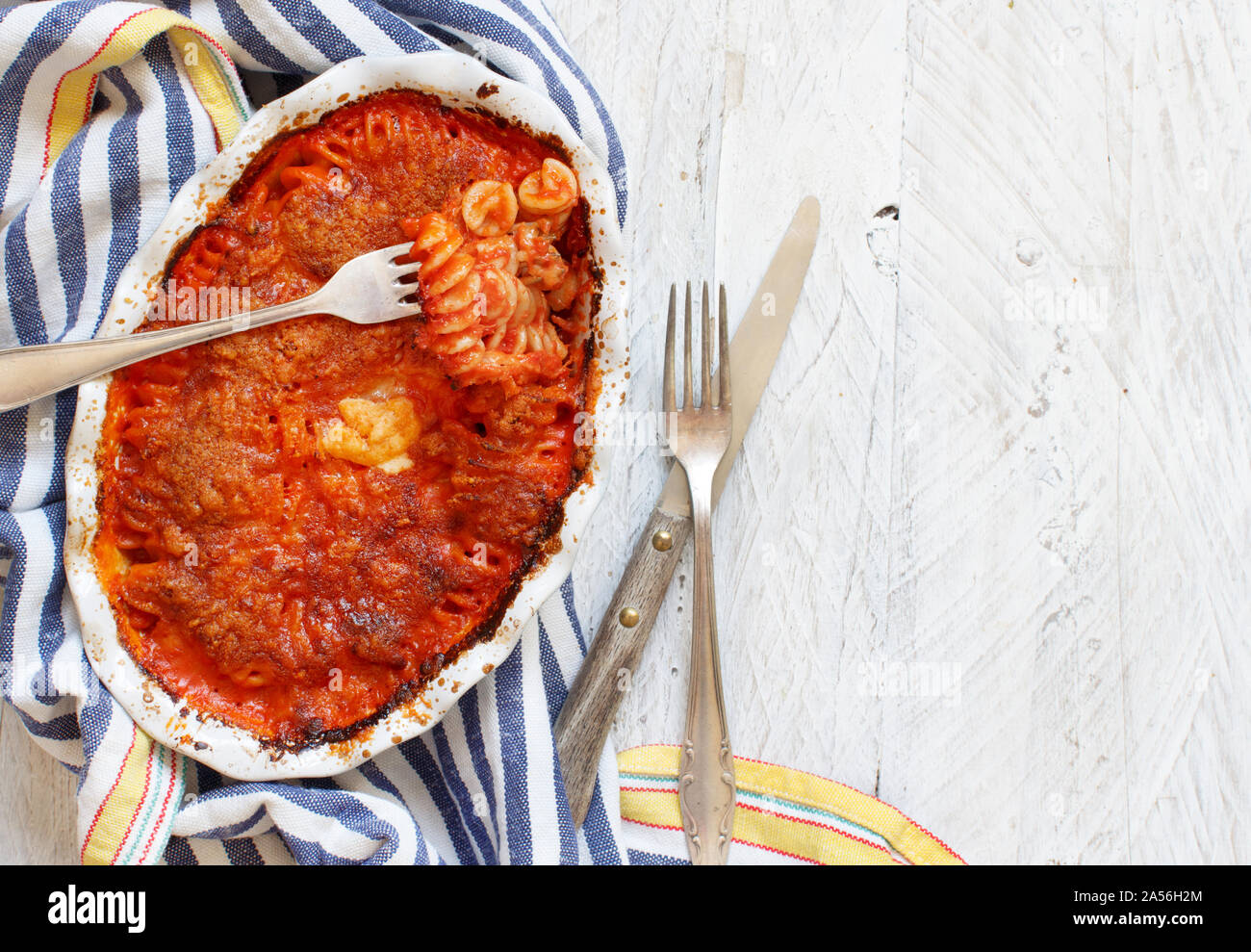 Baked fusilli pasta with tomato sauce and mozzarella cheese Stock Photo ...