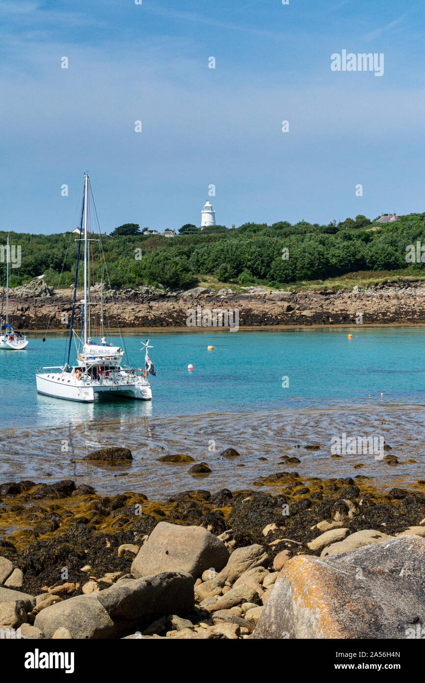 Boats at anchor in The Cove between St Agnes and Gugh, Isles of Scilly ...