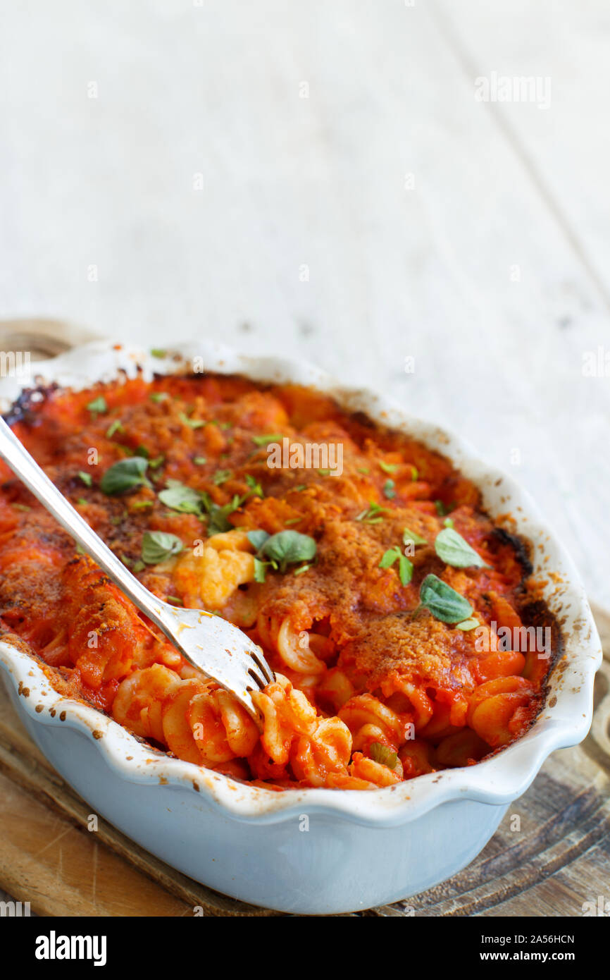 Baked fusilli pasta with tomato sauce and mozzarella cheese Stock Photo ...