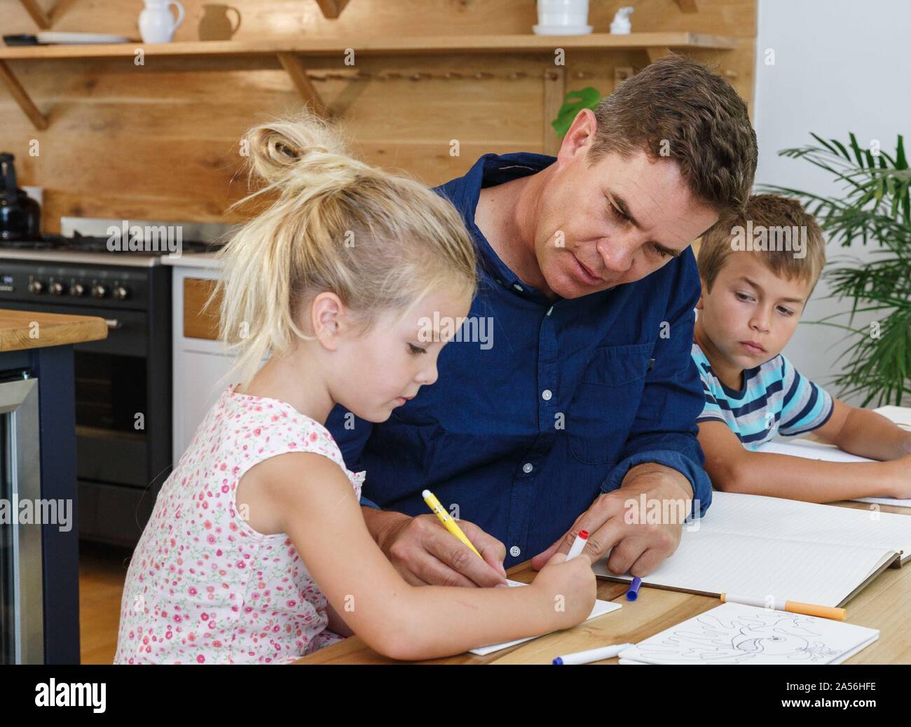 Father and children chores hi-res stock photography and images - Alamy