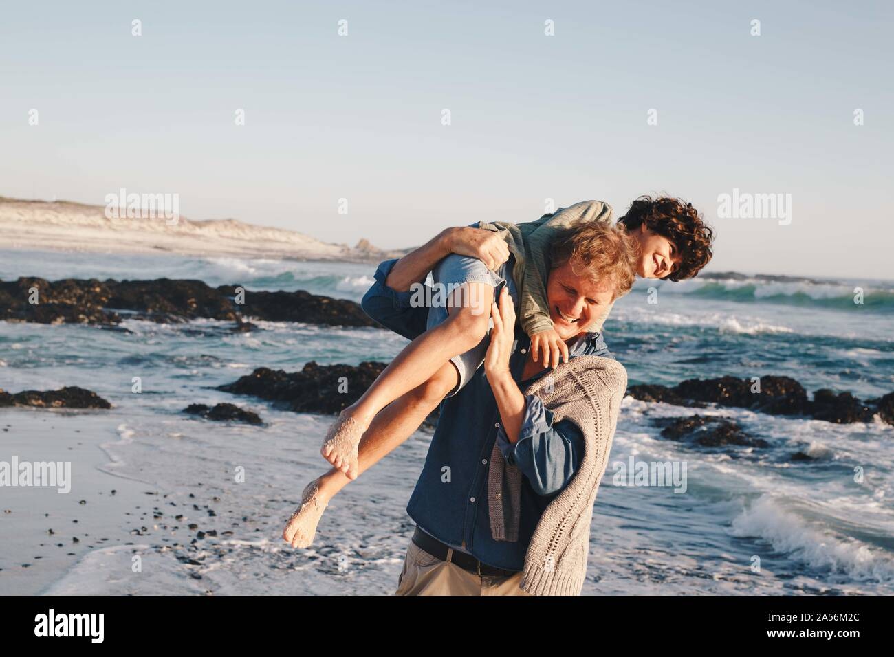 Shoulder carrying hi-res stock photography and images - Alamy