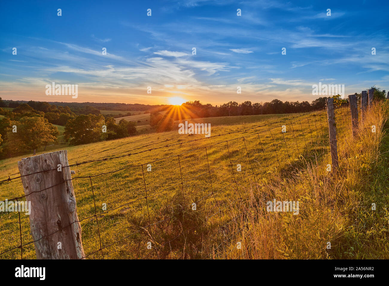 Ranch fence at sunset hi-res stock photography and images - Alamy