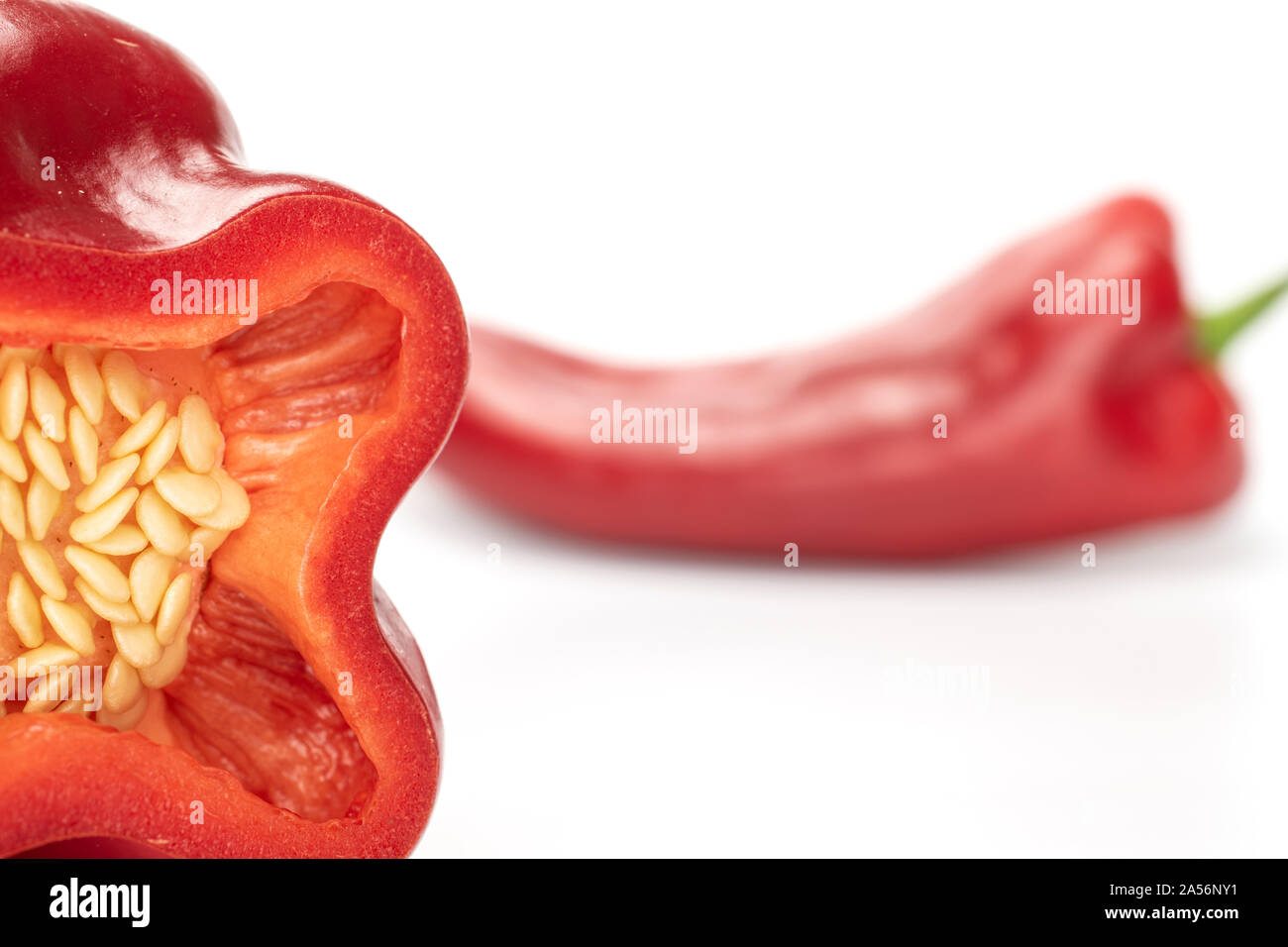 Group of one whole one half of sweet red bell pepper isolated on white ...