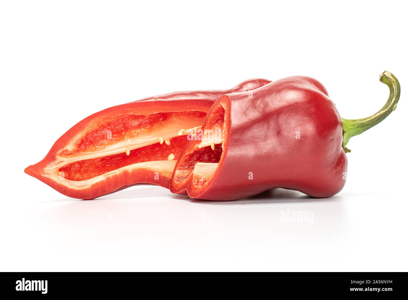 Group of two halves of fleshy sweet red bell pepper isolated on white ...
