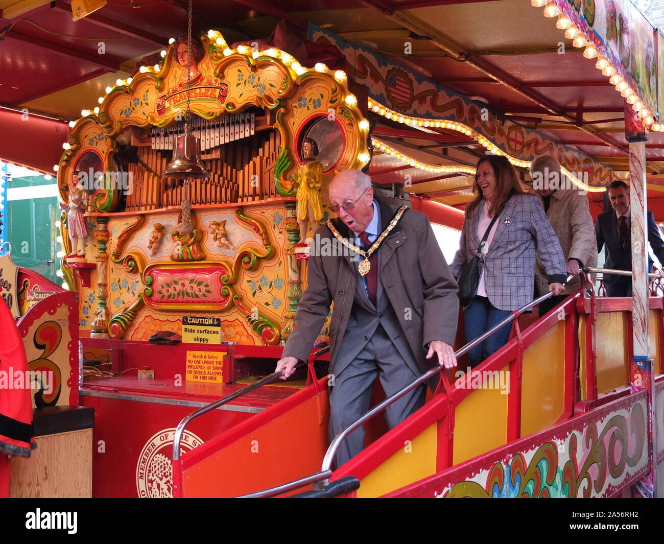 Dignitaries test the Cake Walk ride at Ilkeston Charter Fair. It's one ...