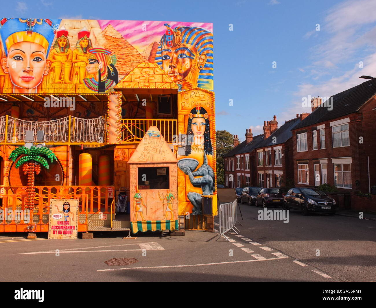 Fun fair rides in the town centre Ilkeston Charter Fair 2019. One of ...