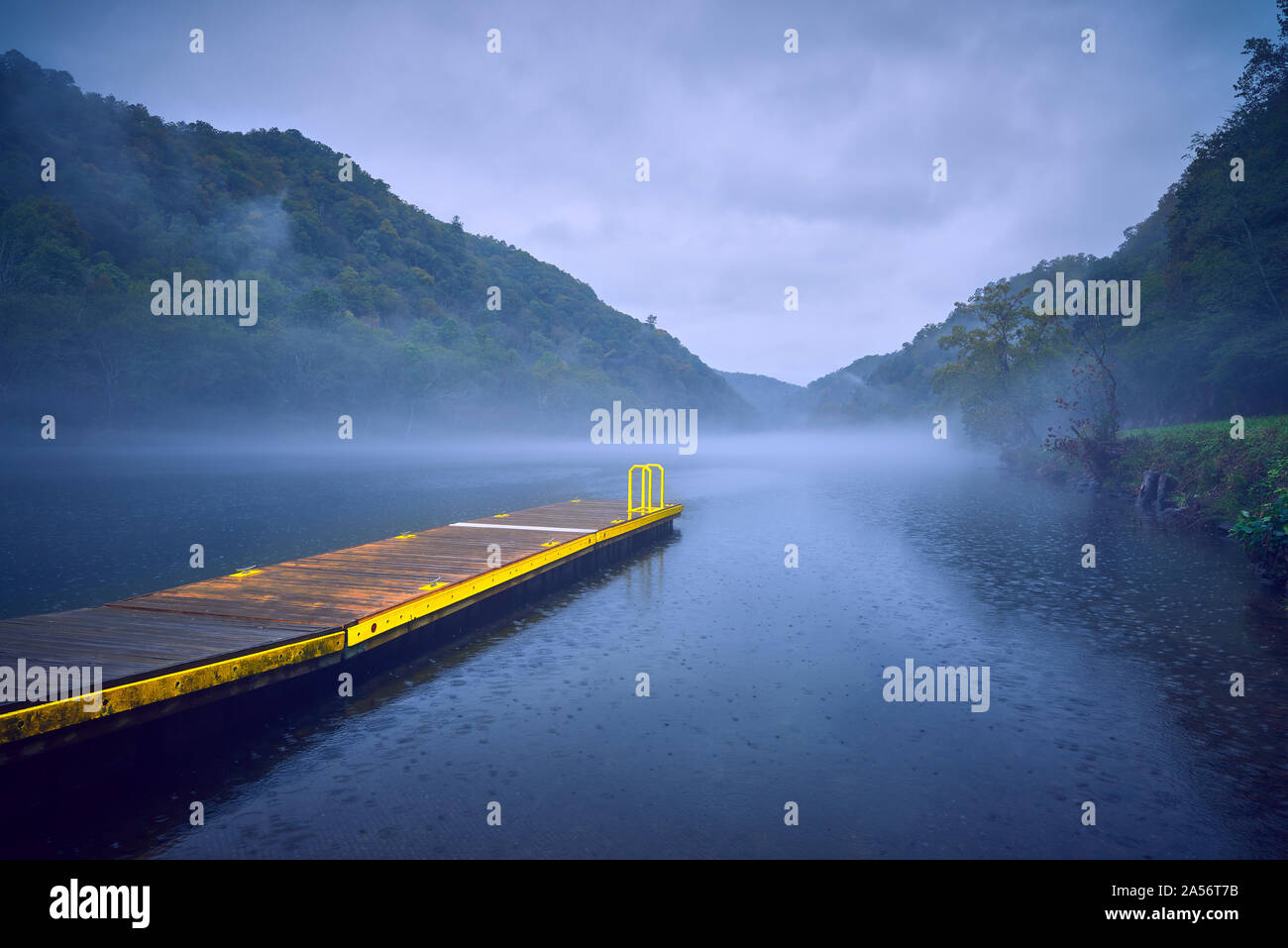 Boat Dock in Rainy Weather Stock Photo - Alamy