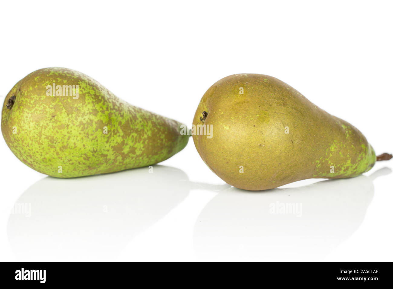 Group of two whole fresh green pear isolated on white background Stock ...