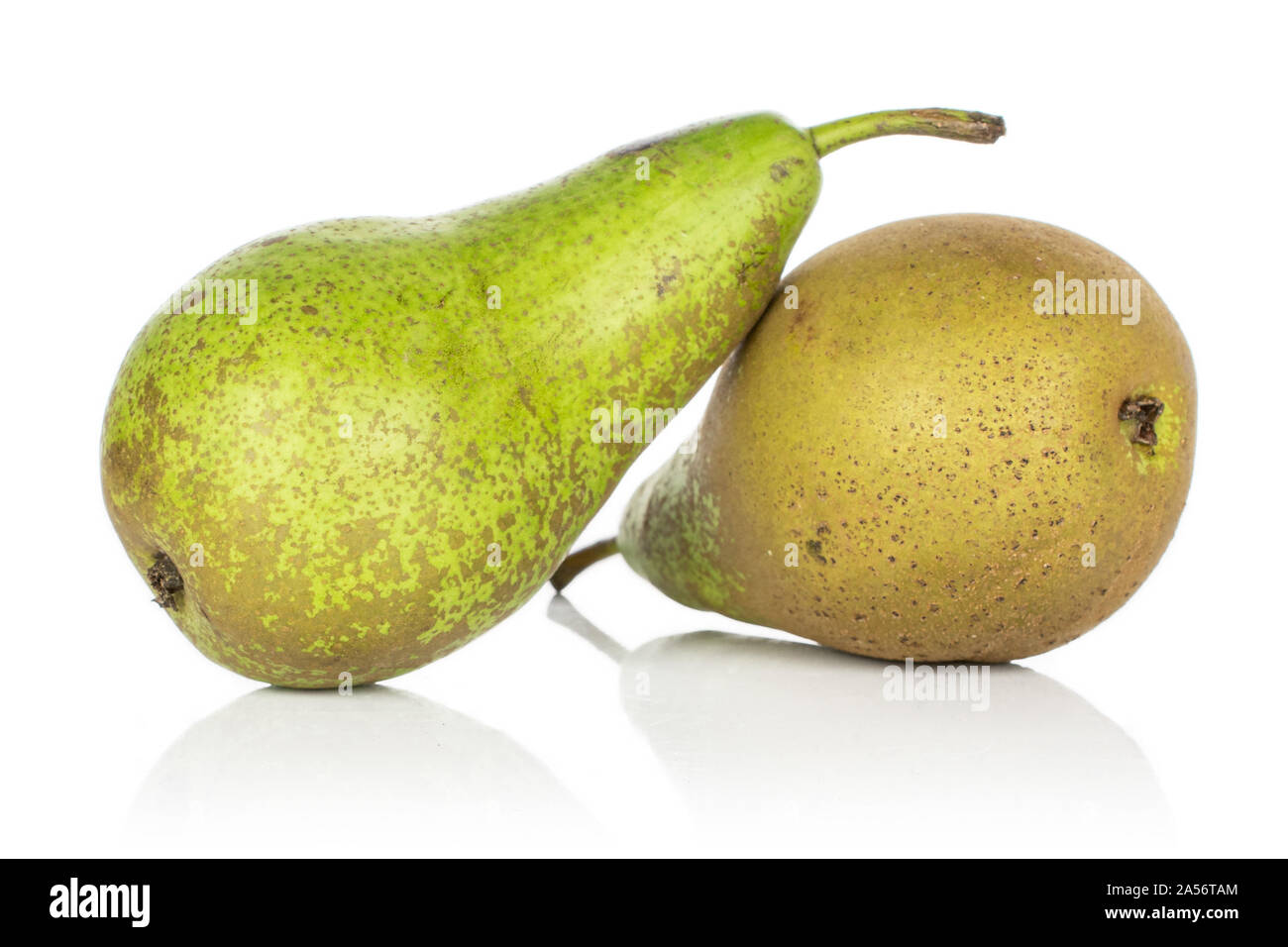 Group of two whole fresh green pear isolated on white background Stock ...