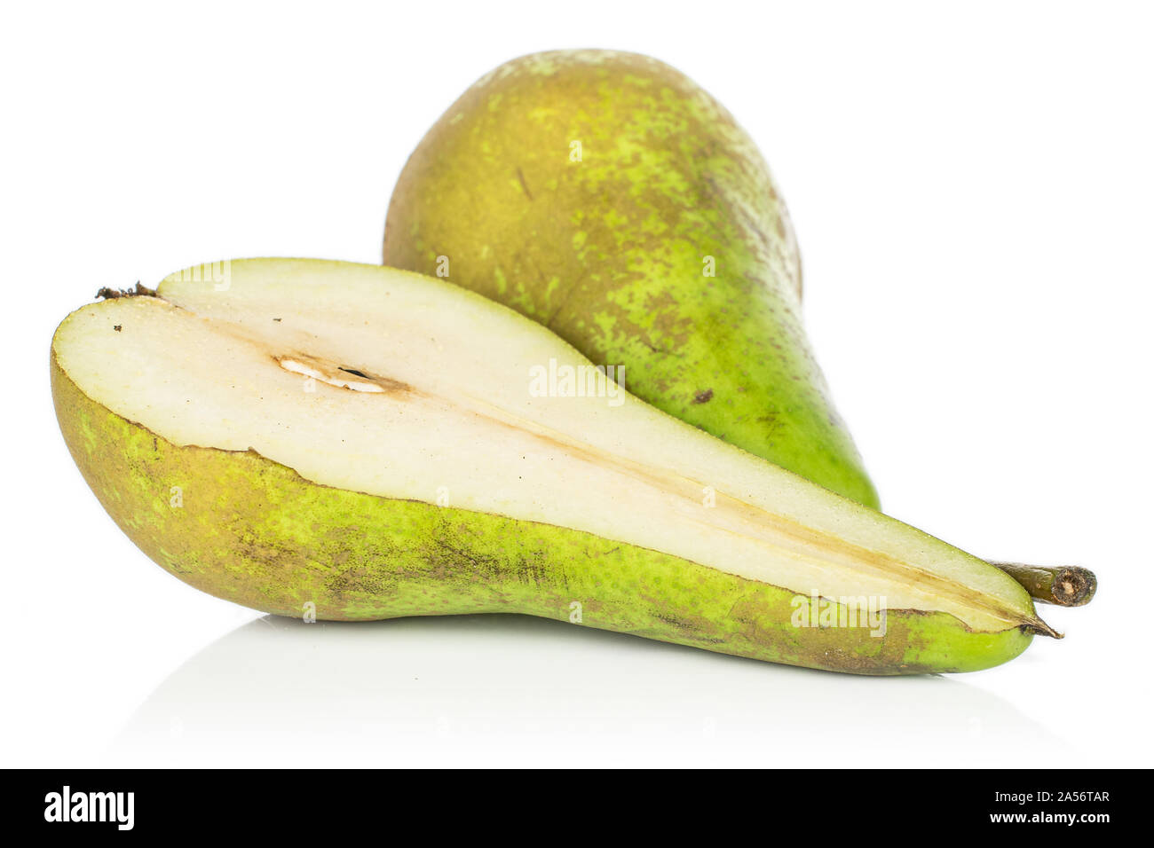 Group of one whole one half of fresh green pear isolated on white ...
