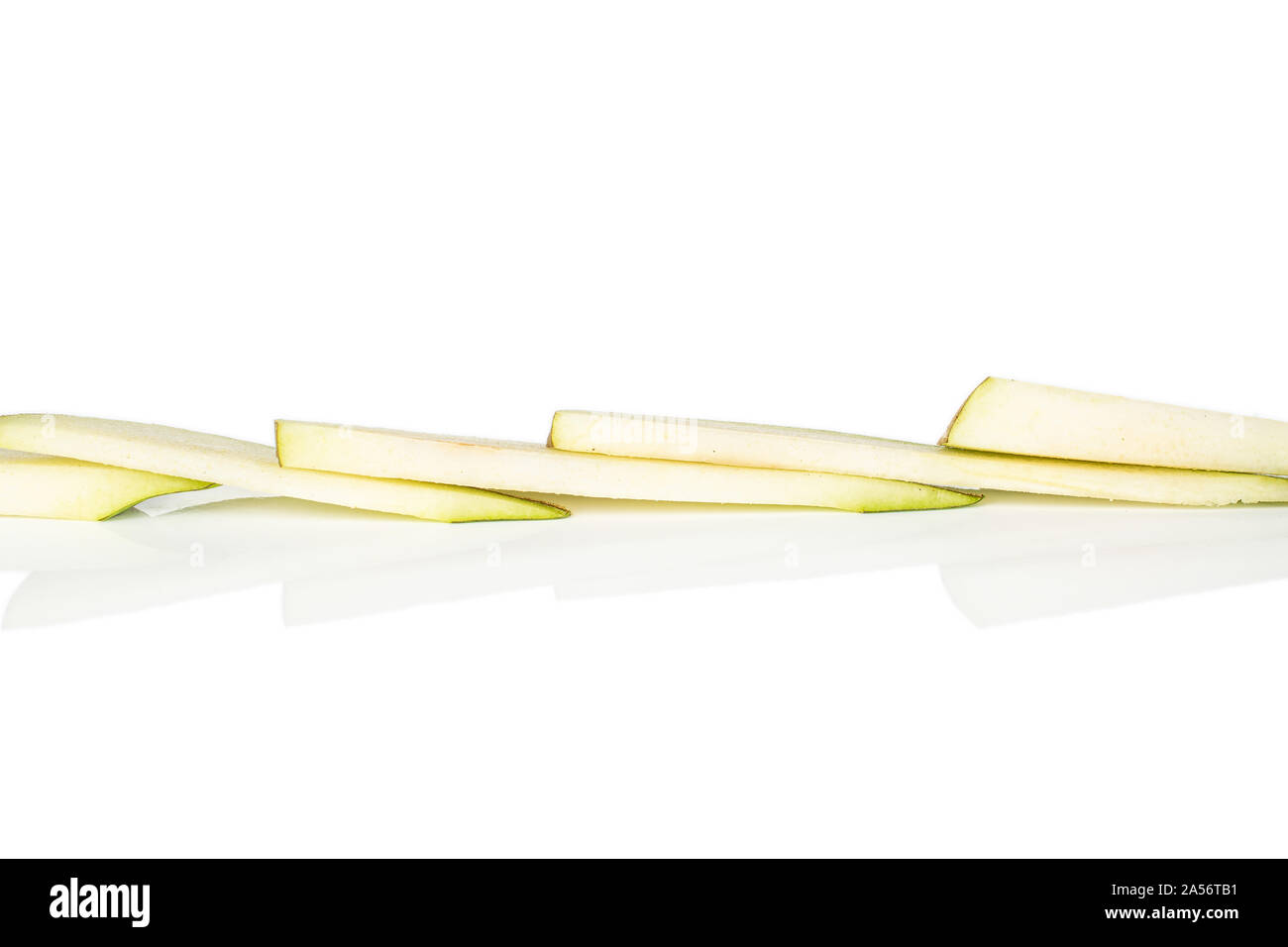 Group of five slices of fresh green pear in row isolated on white ...