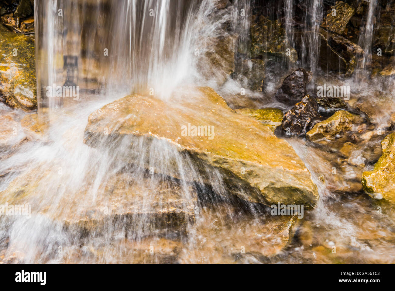 Water Splashing Over Rocks Stock Photo - Alamy