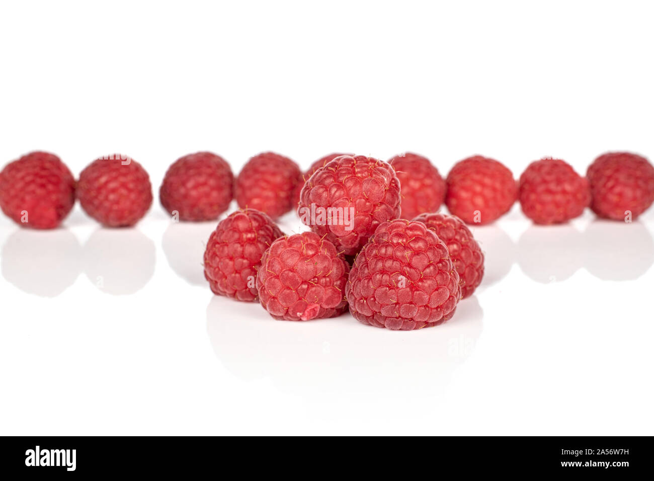 Lot of whole fresh red raspberry isolated on white background Stock ...