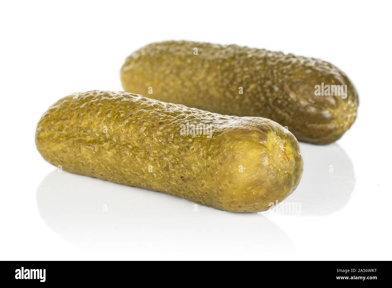 Group of two whole sour green pickle isolated on white background Stock ...