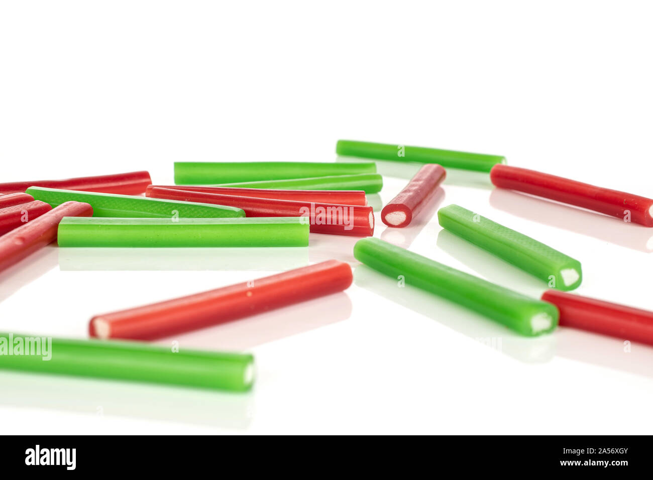 Lot of whole disordered sweet stick candy isolated on white background ...