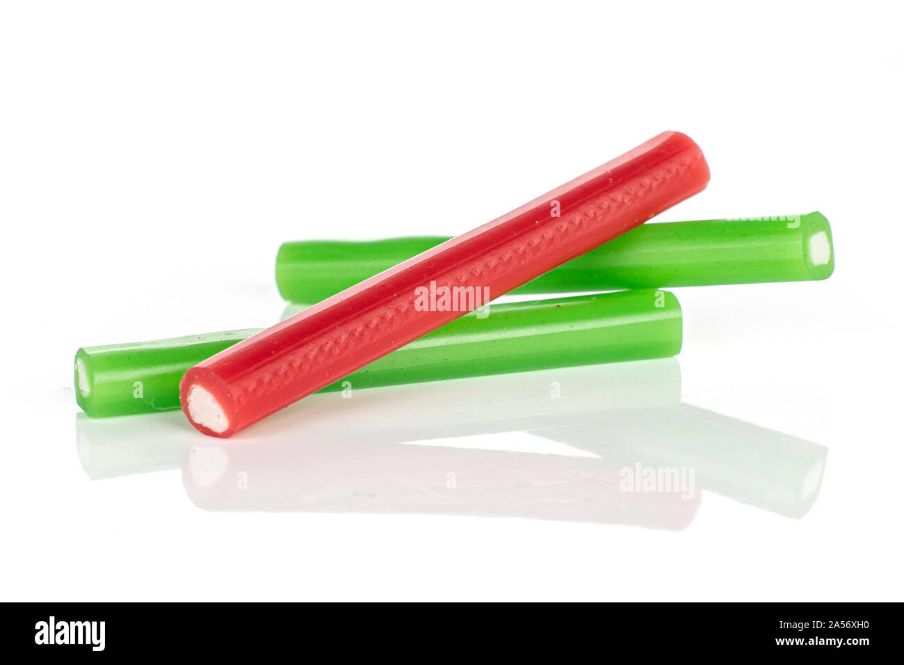 Group of three whole sweet stick candy isolated on white background ...