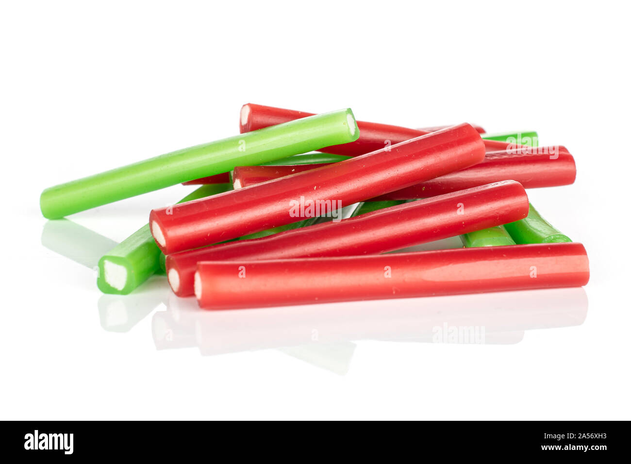 Lot of whole sweet stick candy stack isolated on white background Stock ...