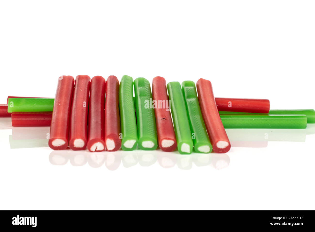 Lot of whole arranged sweet stick candy isolated on white background ...
