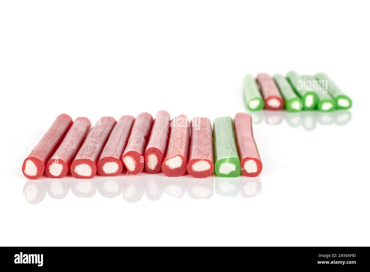 Group of sixteen whole sweet stick candy isolated on white background ...