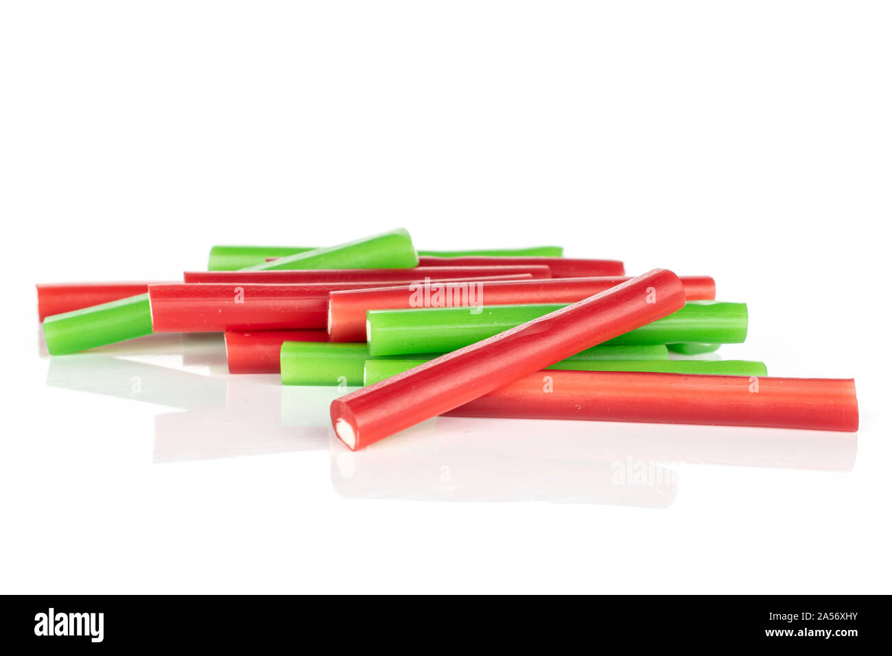 Lot of whole disordered sweet stick candy isolated on white background ...