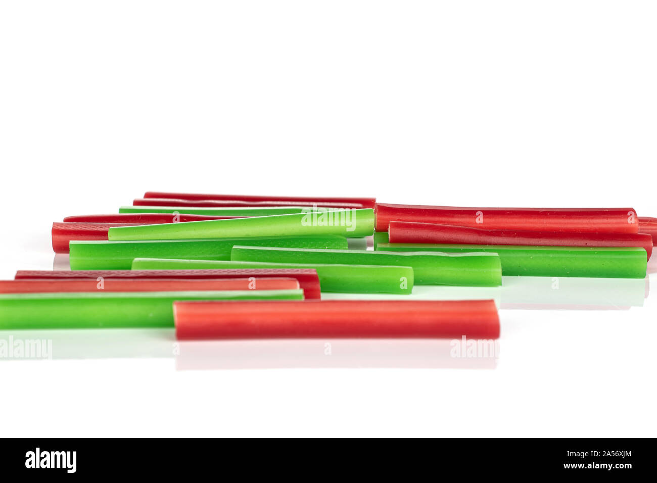 Lot of whole disordered sweet stick candy isolated on white background ...