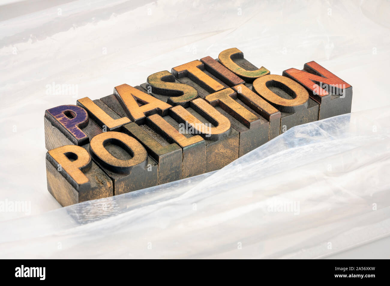 plastic pollution typography and concept - text in vintage letterpress ...
