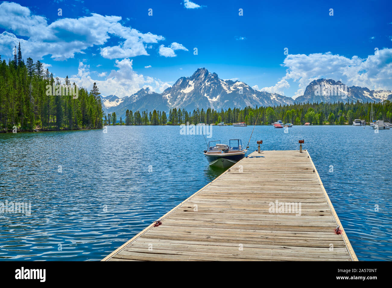 Motoboat dock on Jackson Lake at Coulter Bay Stock Photo - Alamy